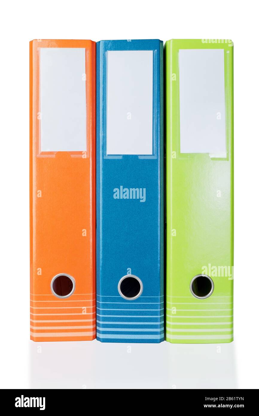 Three colored folders for office clerical. On a white background Stock ...
