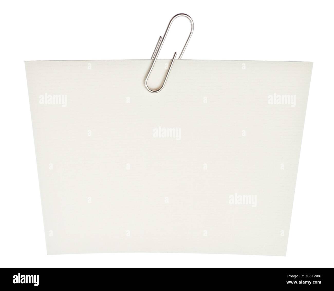 Office paper clip on a piece of paper. On a white background Stock ...