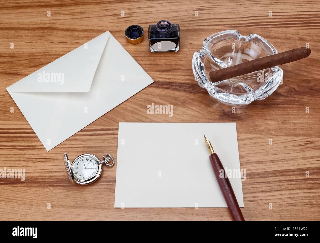 Composition on the table not yet finished letter the envelope, cigar ...