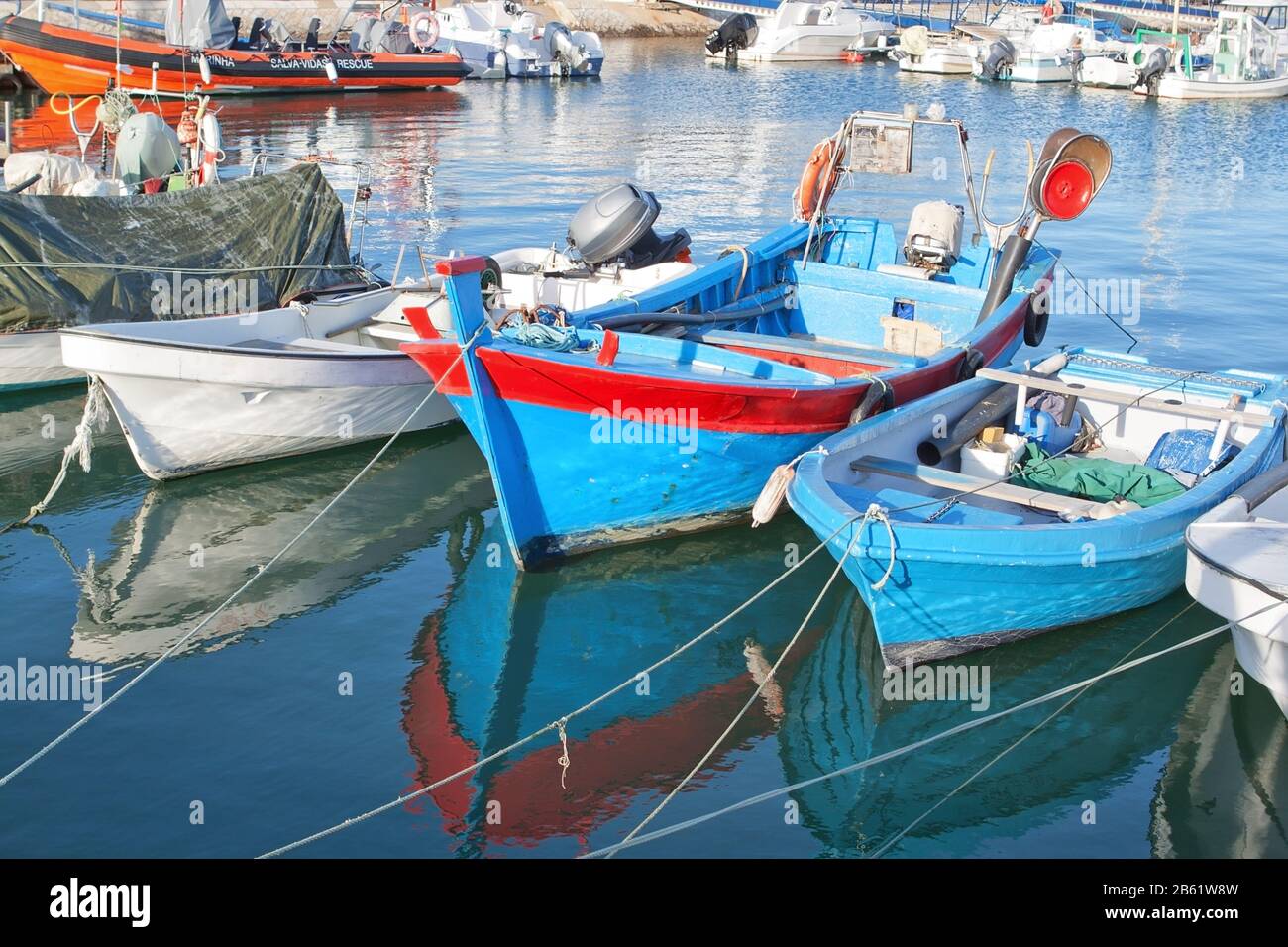 Old fishing boats in the Portuguese port Stock Photo - Alamy