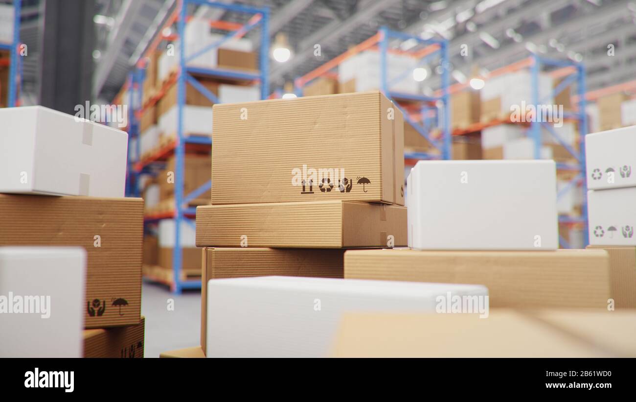 Cardboard boxes in middle of the warehouse, logistic center. Huge ...