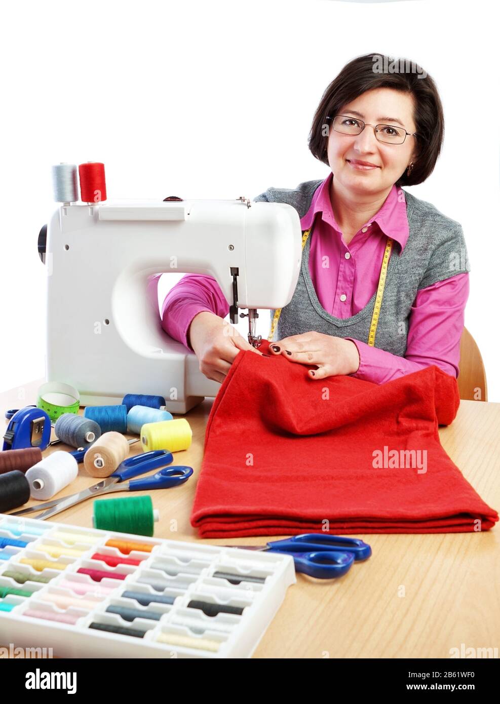 Woman sews on industrial hi-res stock photography and images - Alamy