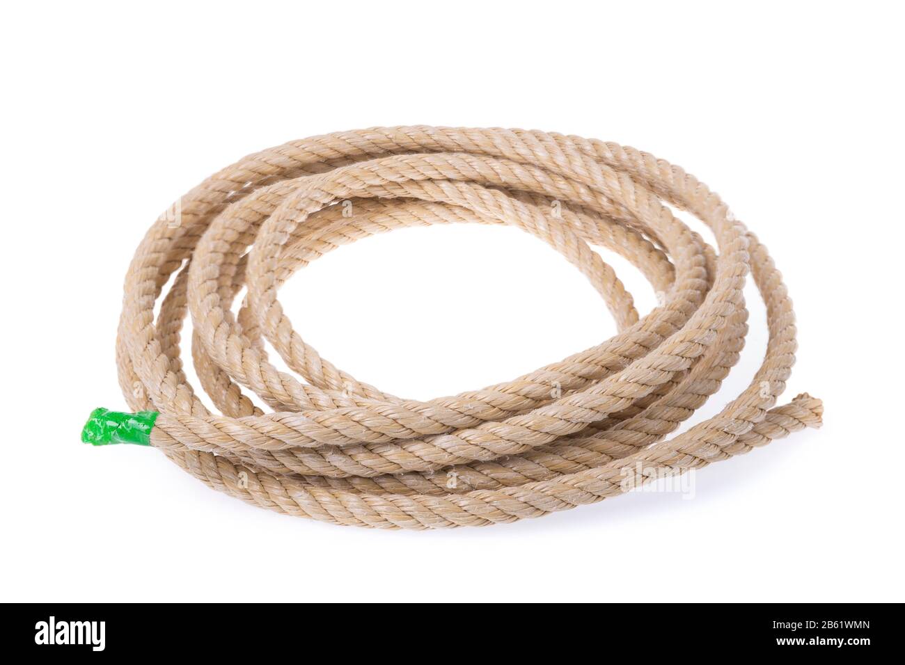 A roll of sturdy rope material. Twisted into a circle. On a white ...