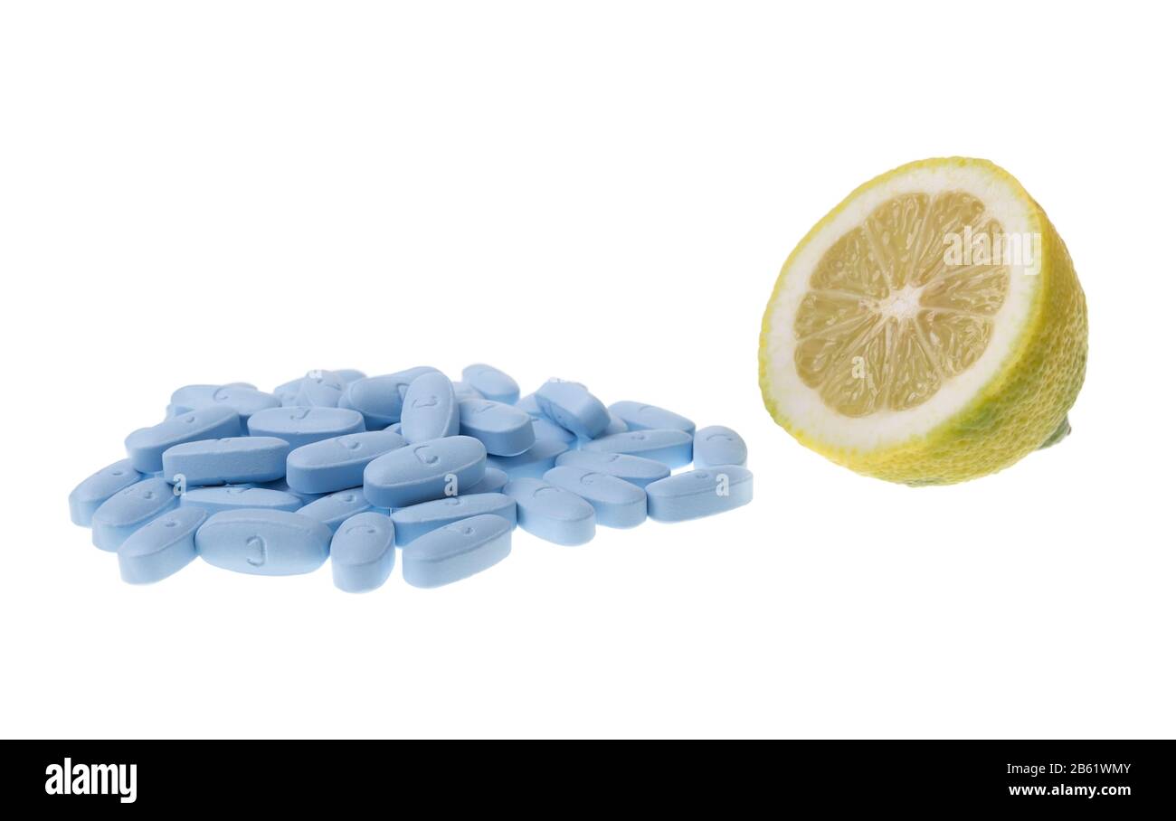 Tablets Vitamins and lemon fruit comparison is better for your health ...