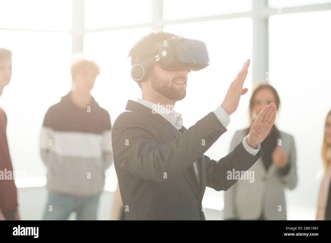 background image of a young man in a virtual reality helmet Stock Photo ...