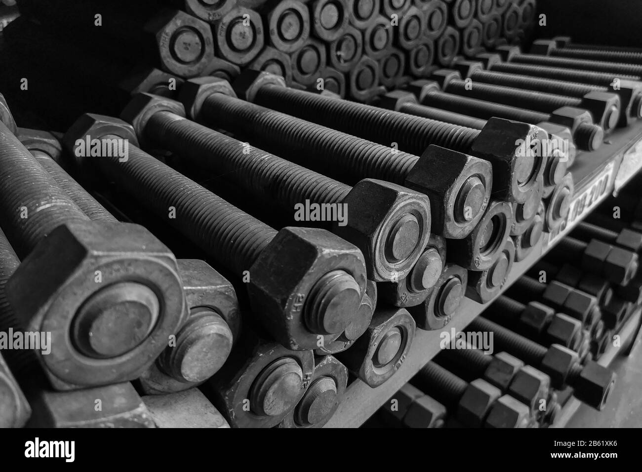 Hard metal material nut an bolt on shelf for heavy industry machinery ...