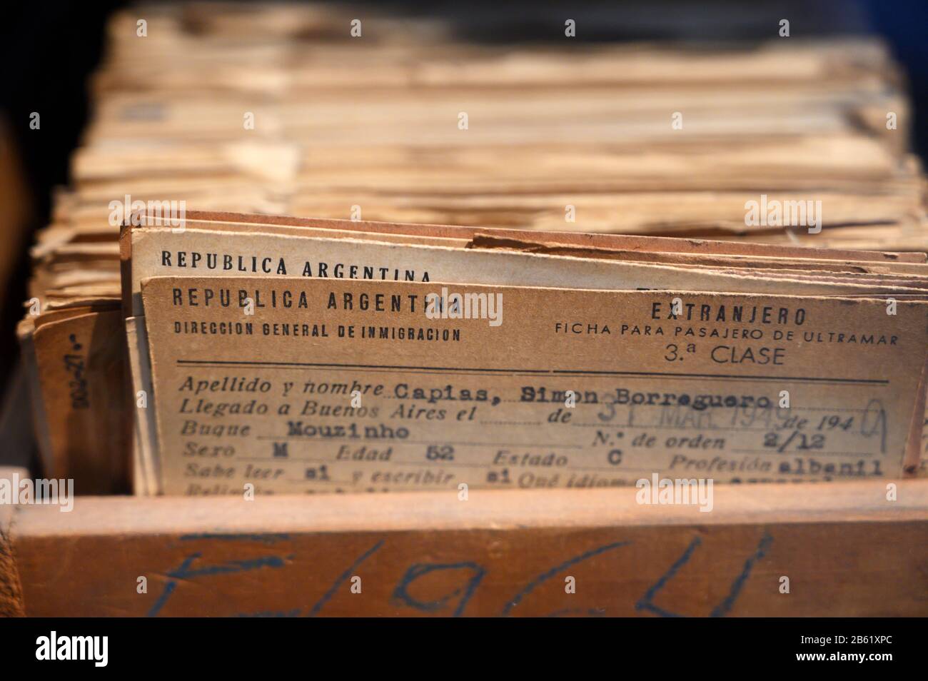 Old registration cards from immigrants can be seen in an exhibition of ...