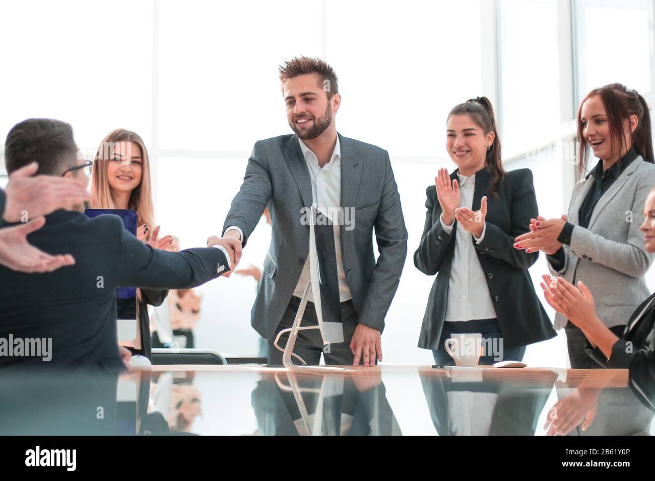 business team supporting business partners with applause Stock Photo ...