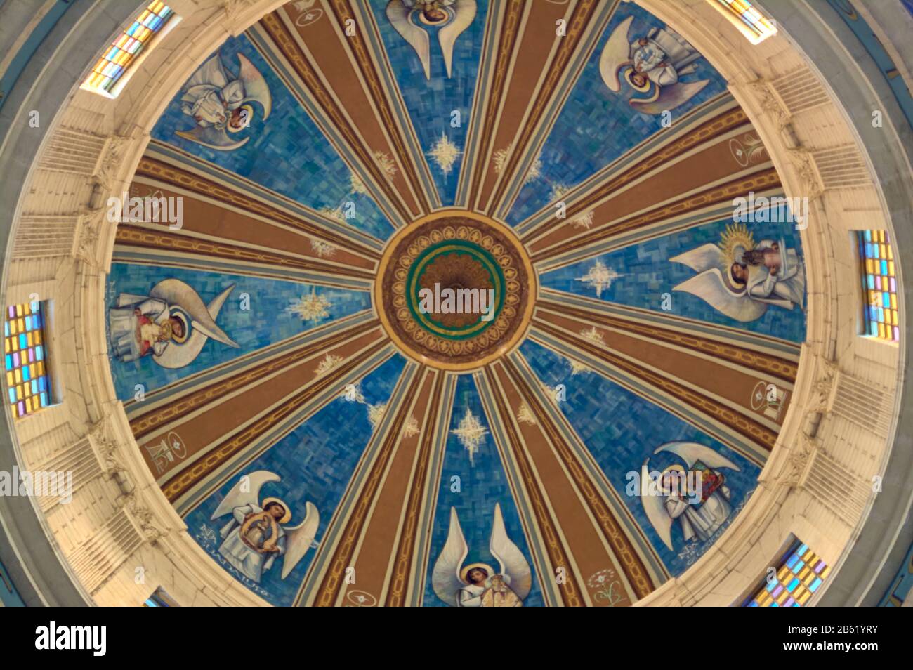 detail of the fresco and stained glass of the dome of a church Stock ...