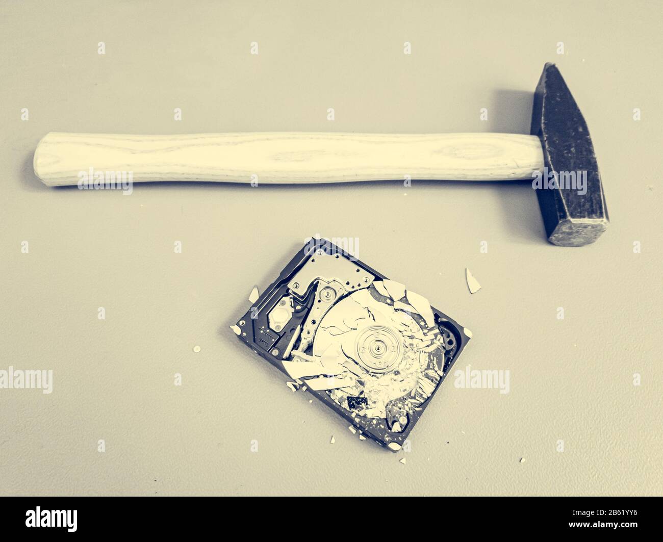 Shattered platter in computer hard drive disk and a hammer Stock Photo ...