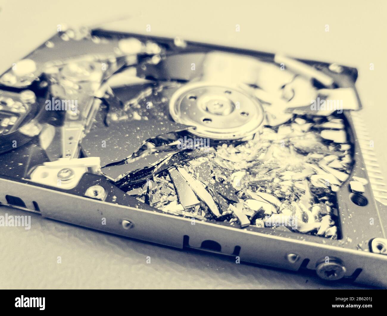 Shattered platter of computer hard drive disk Stock Photo - Alamy