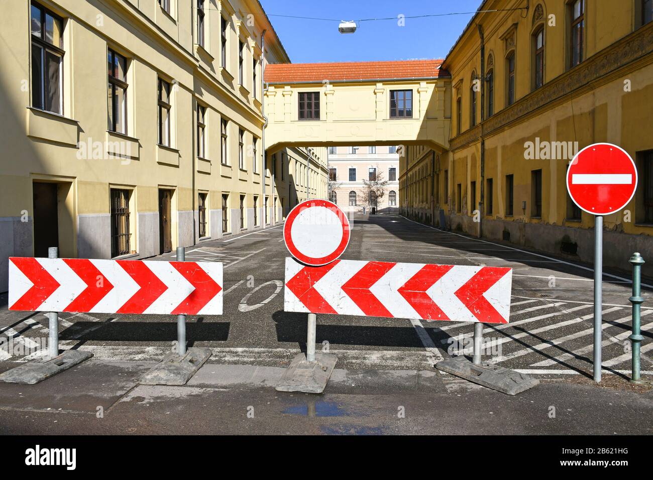Road closed with arrow sings in the city Stock Photo - Alamy