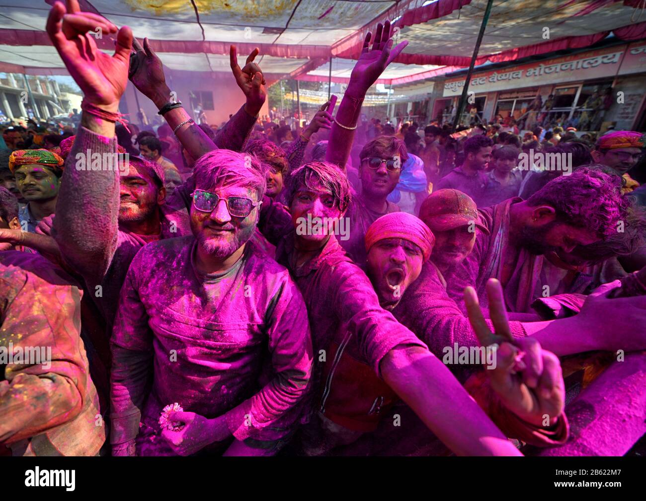 Hindu devotees covered with colorful (Vermilion powder) during the ...