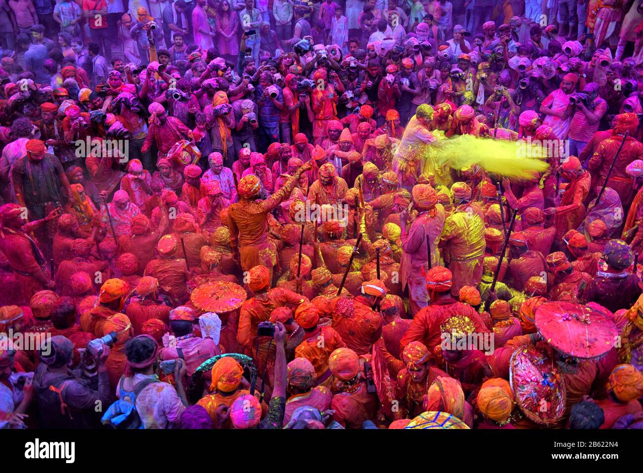Hindu devotees covered with colorful (Vermilion powder) during the ...