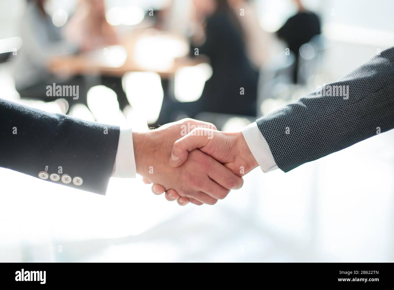 close up. business handshake on an office background Stock Photo - Alamy