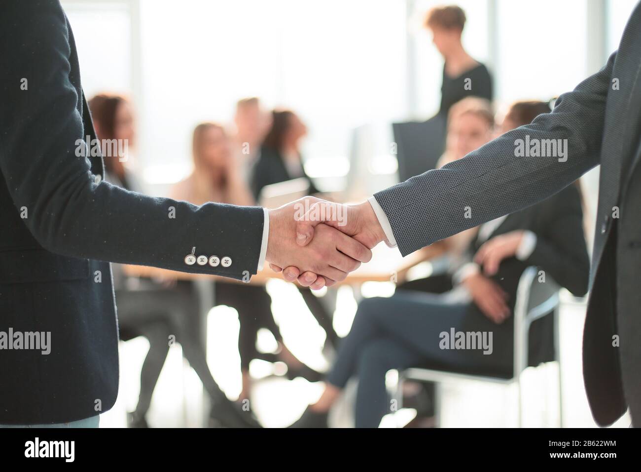 close up. business handshake on an office background Stock Photo - Alamy