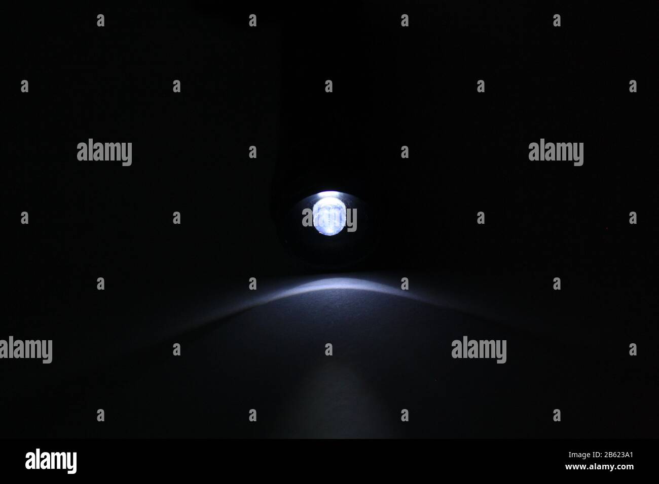 flashlight in the dark Stock Photo - Alamy