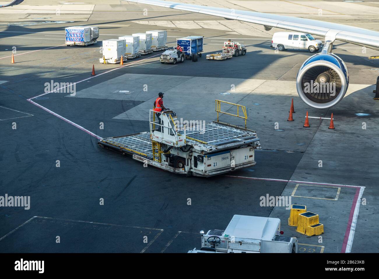 New York City, USA - August 4, 2018: Workers loading and unloading ...