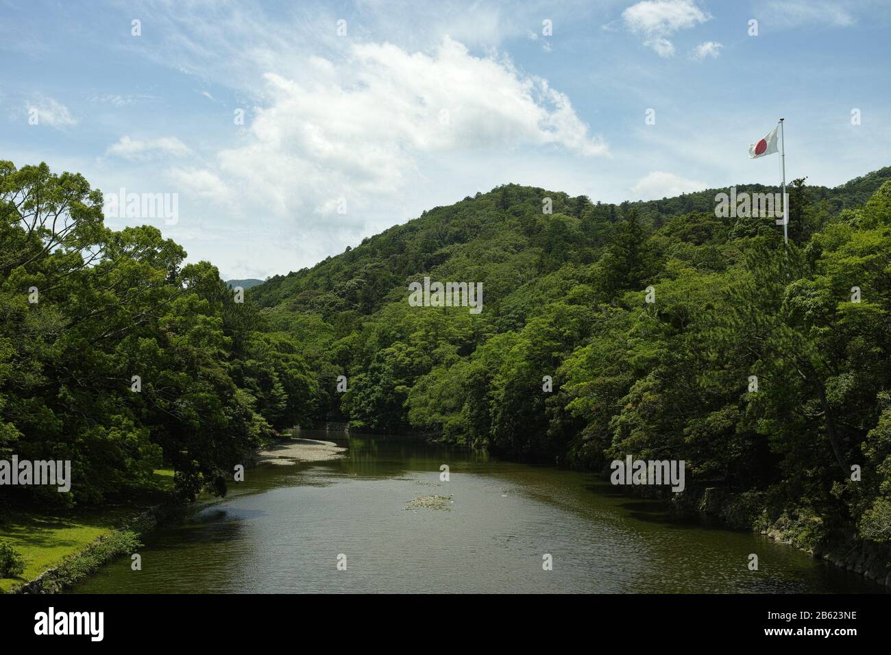 The Japanese flag flying above a natural scene Stock Photo - Alamy