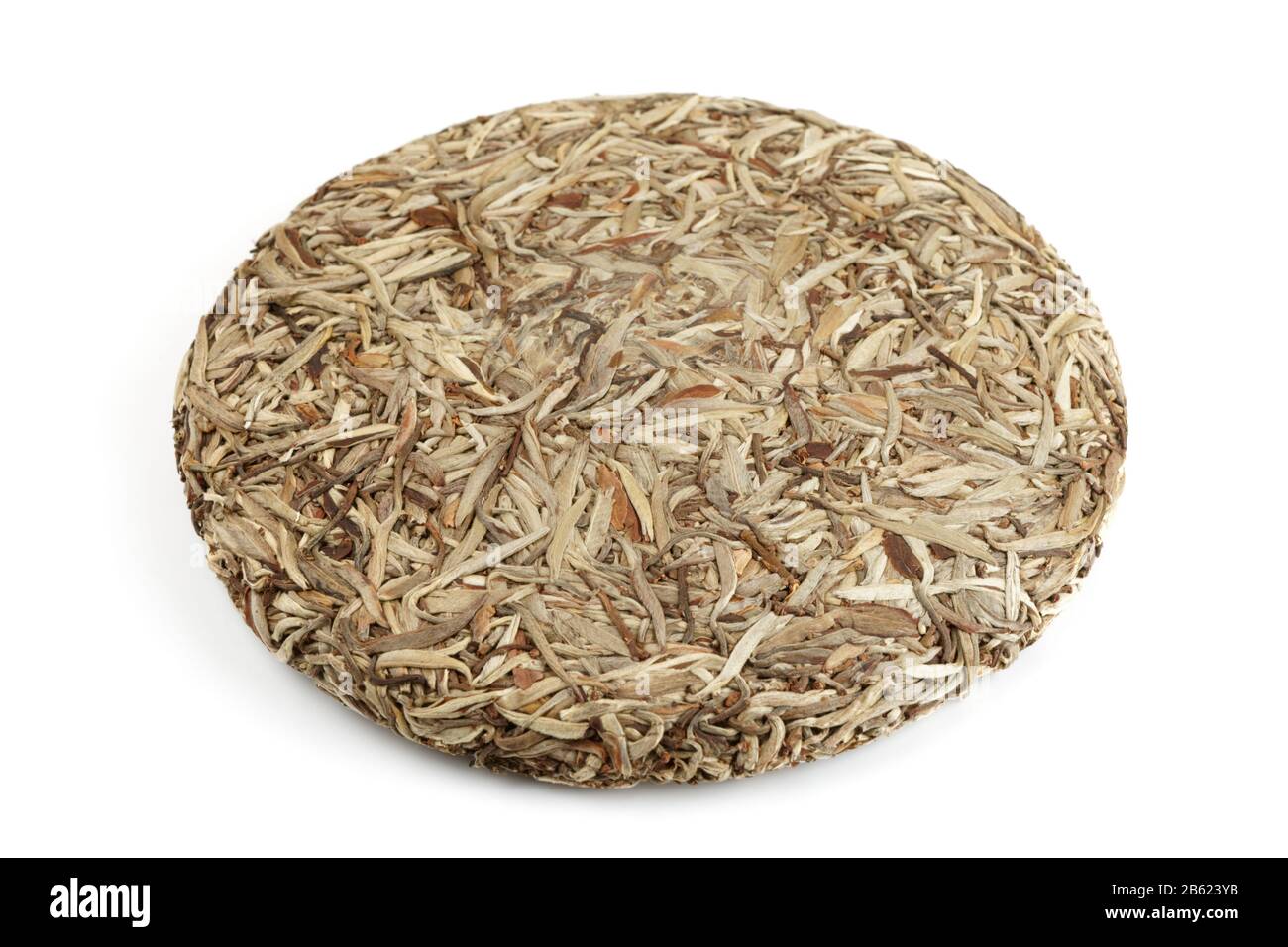 Disc of Chinese pu erh tea isolated on white background Stock Photo - Alamy