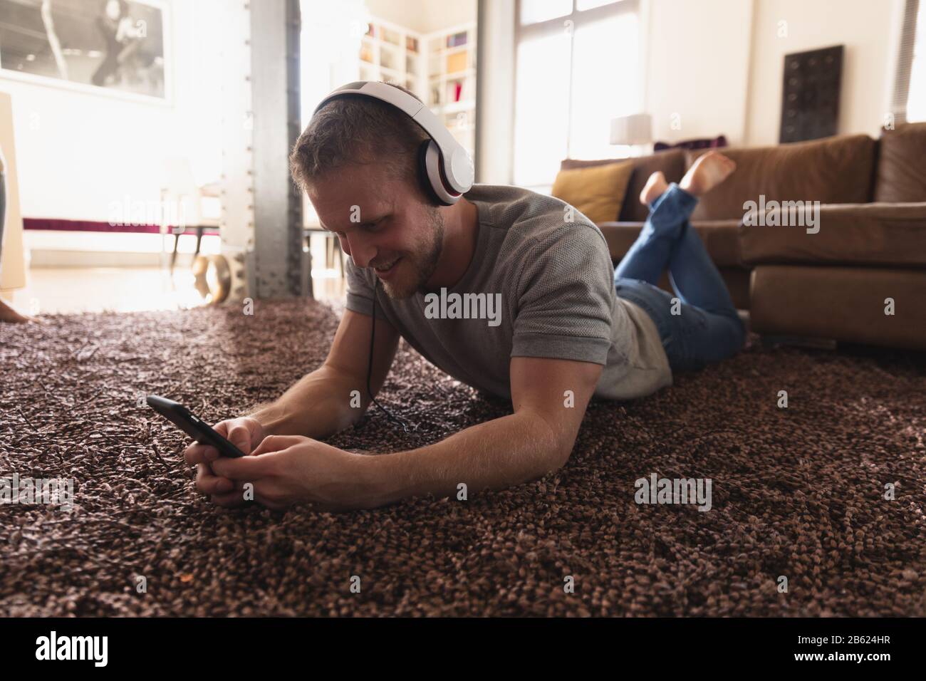 Male headphones phone hi-res stock photography and images - Alamy
