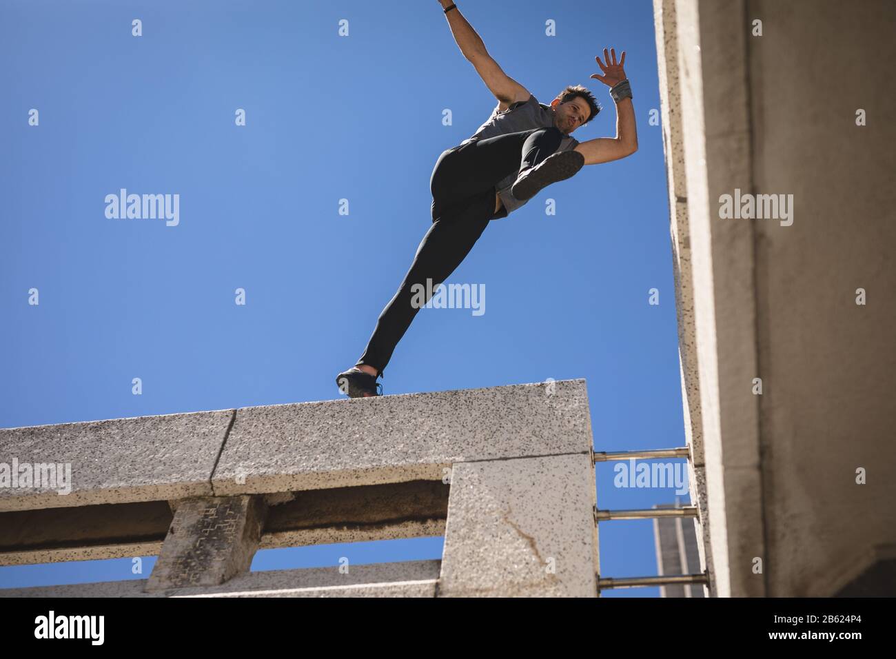 Jumping from building hi-res stock photography and images - Alamy