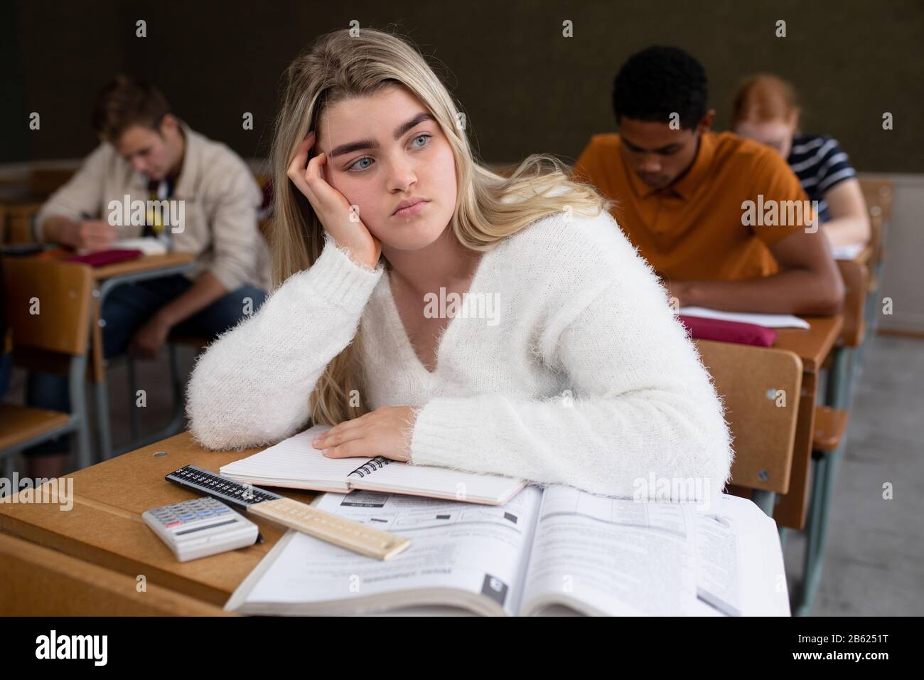 Confused girl in class hi-res stock photography and images - Alamy