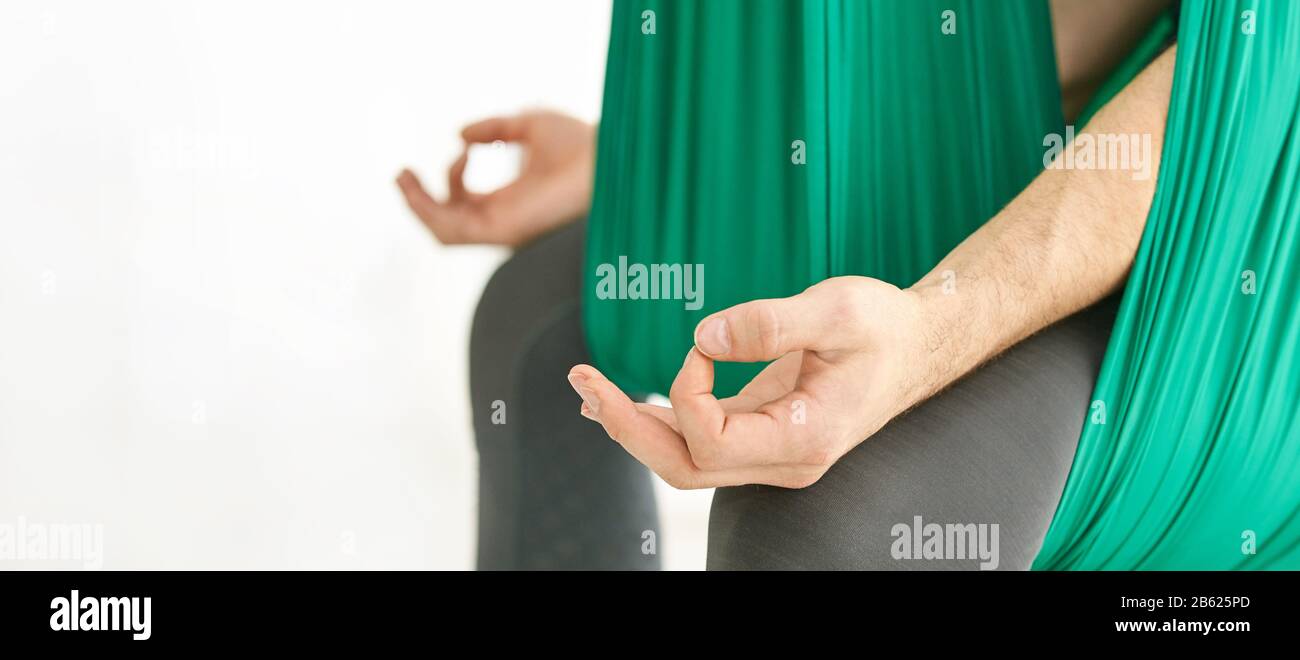 Man yoga class. Black wear. Calm relax pose Stock Photo - Alamy