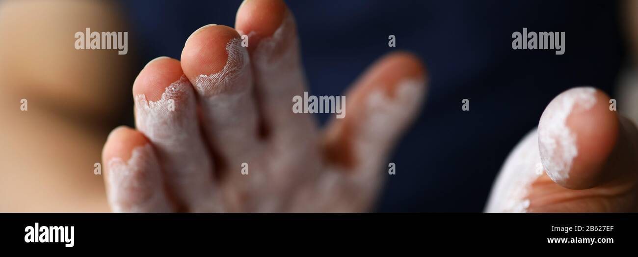Male hands smeared with magnesium powder ready to workout Stock Photo ...