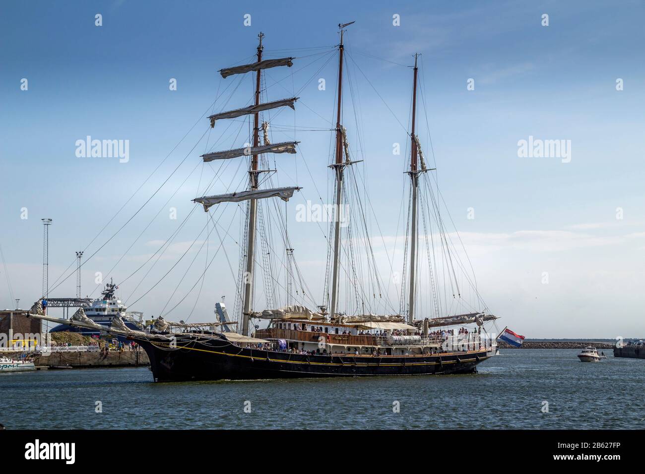 Esbjerg, Denmark - 02 August 2014: Large ship heading in through port ...