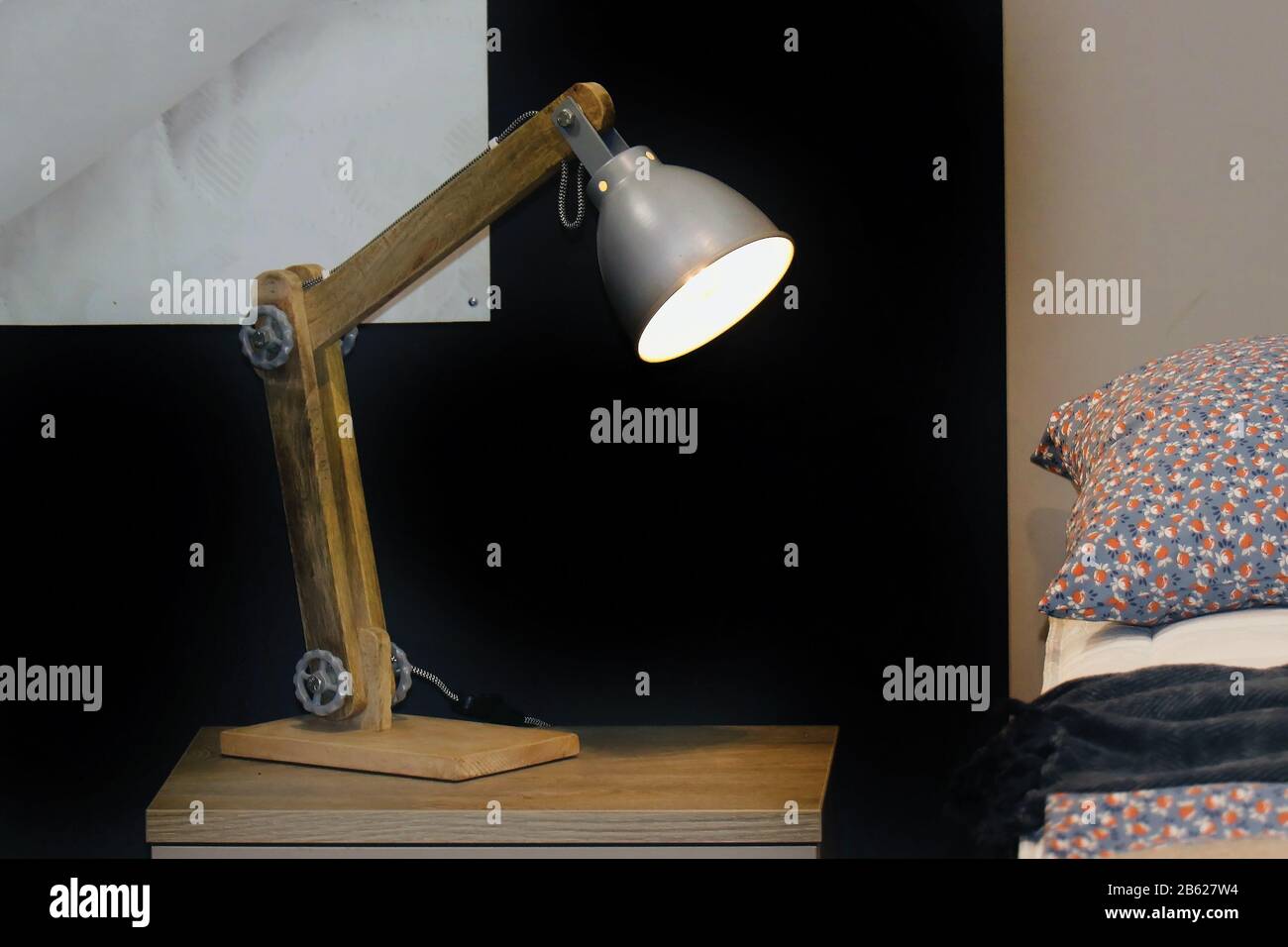 Bed detail with lit table lamp hi-res stock photography and images - Alamy