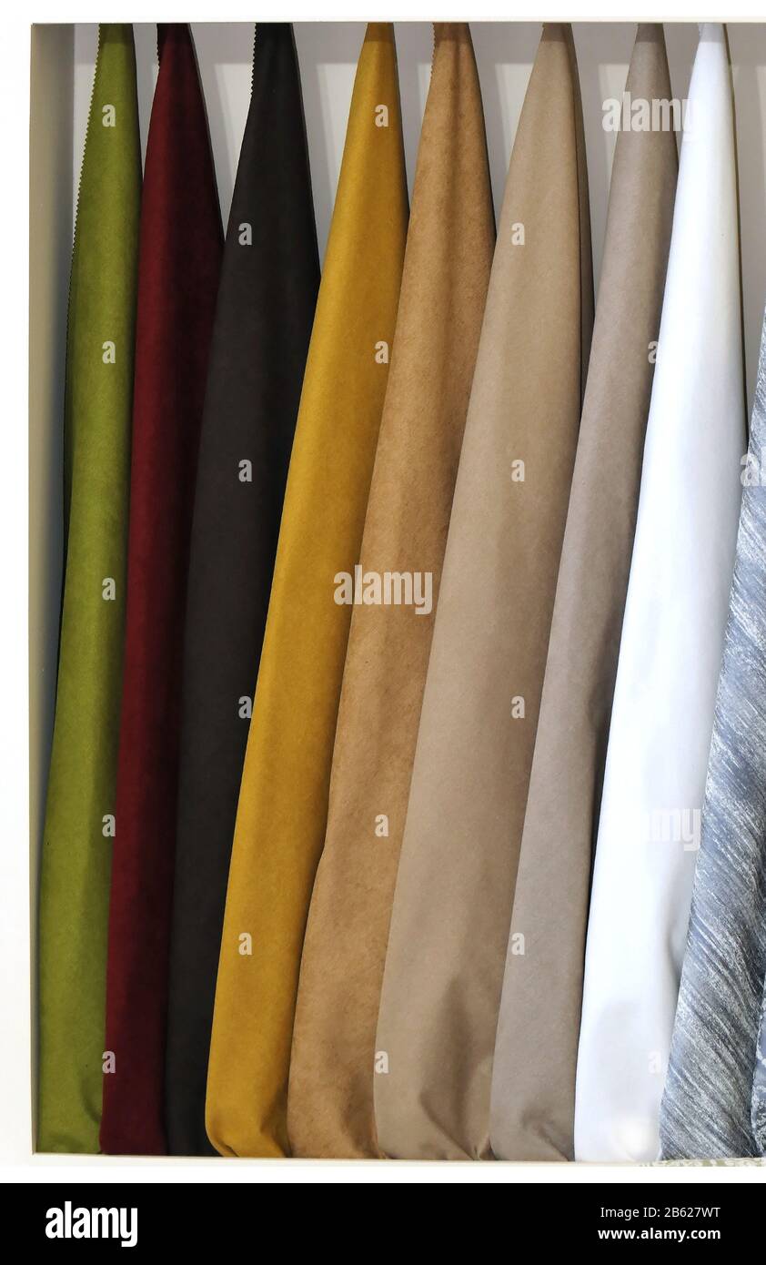 Fabric samples hanging on wall hi-res stock photography and images - Alamy