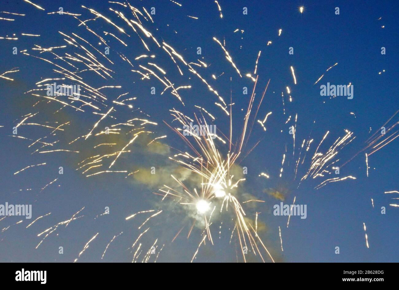 Fireworks display in sky above Stock Photo - Alamy