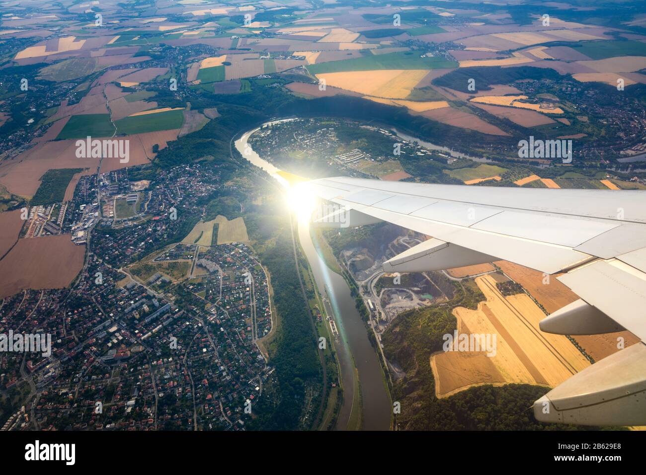 Airplane windows view above the earth on landmark down. View from an ...