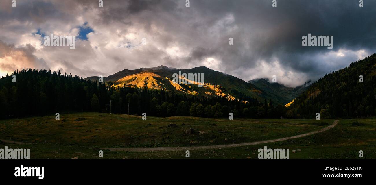 Play of light and shadow on mountains of Caucasus Stock Photo - Alamy