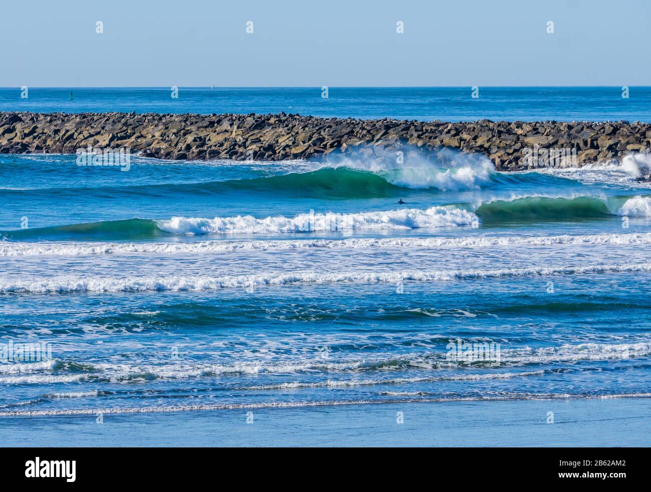 Waves roll in along the jetty in Westport, Washington Stock Photo - Alamy