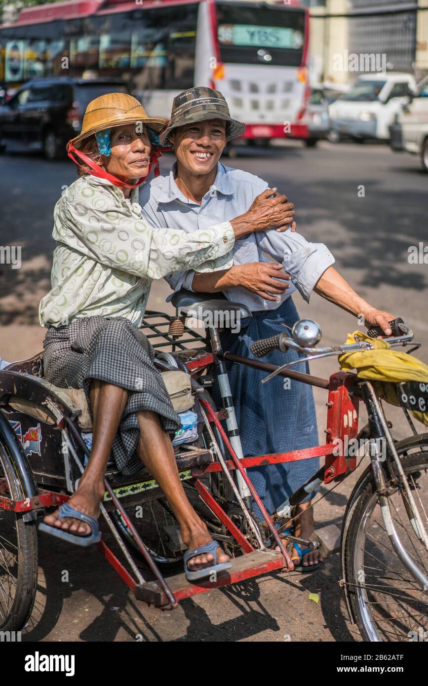 Rickshaw rider in the street, Yangon, Myanmar, Asia Stock Photo - Alamy