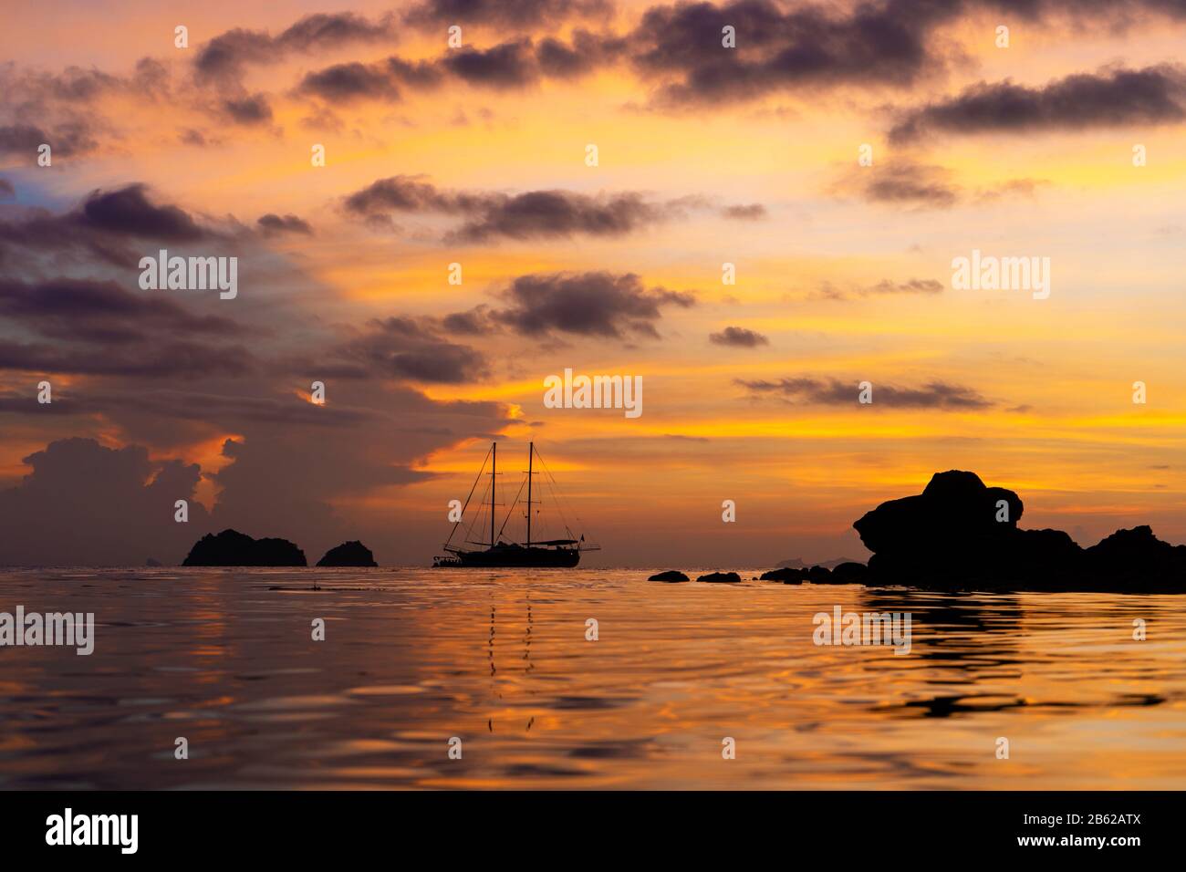Colorful sunset on a tropical beach. Orange sunset on the ocean ...
