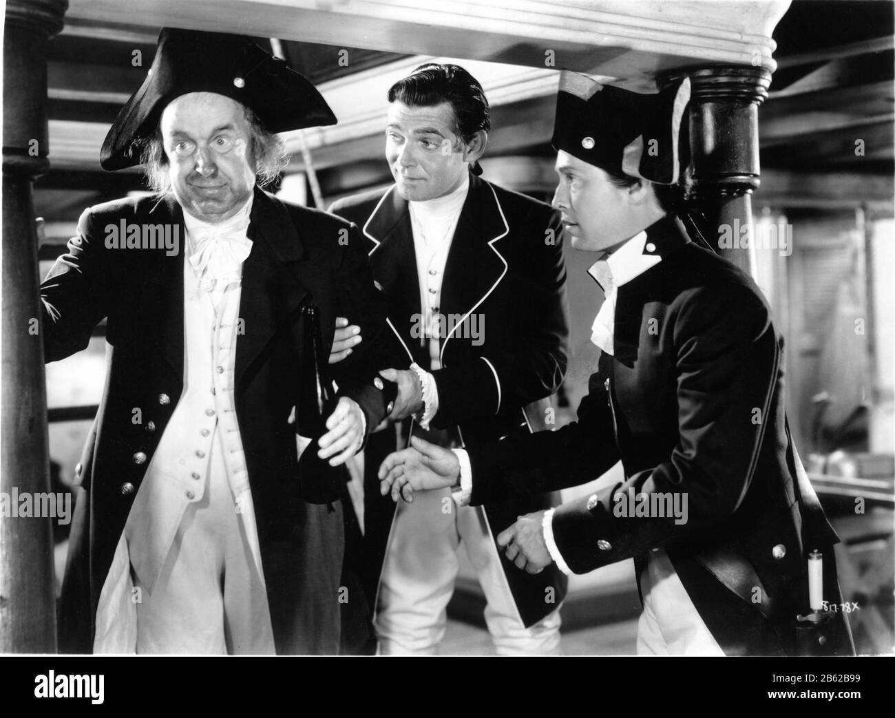 DUDLEY DIGGES as Bacchus the drunken ship's doctor CLARK GABLE as ...