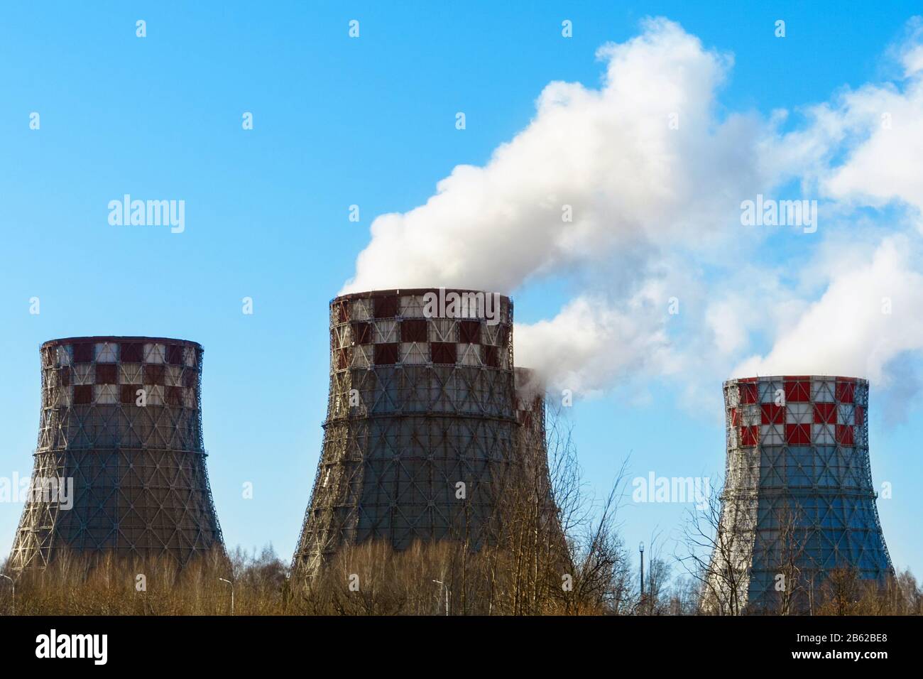 Big thick smoke from a big tall pipe. View of pipes with smoke after ...