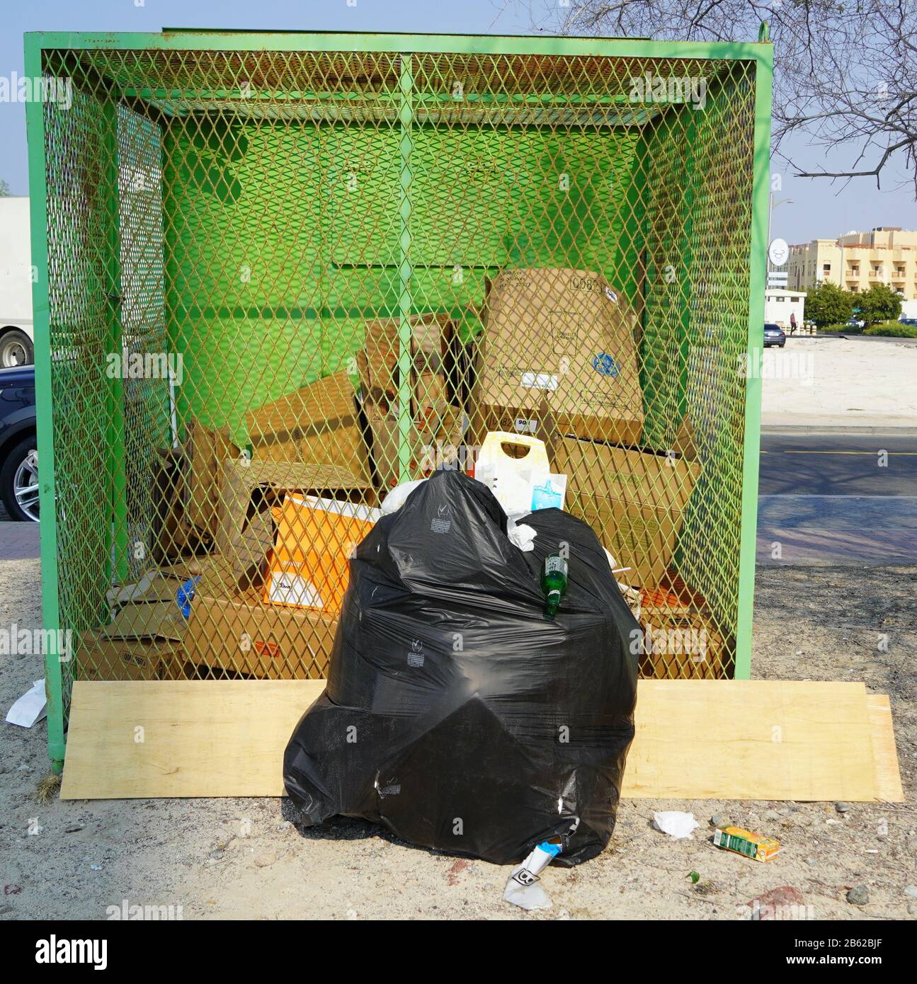 Dubai UAE December 2019 Overflowing Black full garbage bag isolated ...