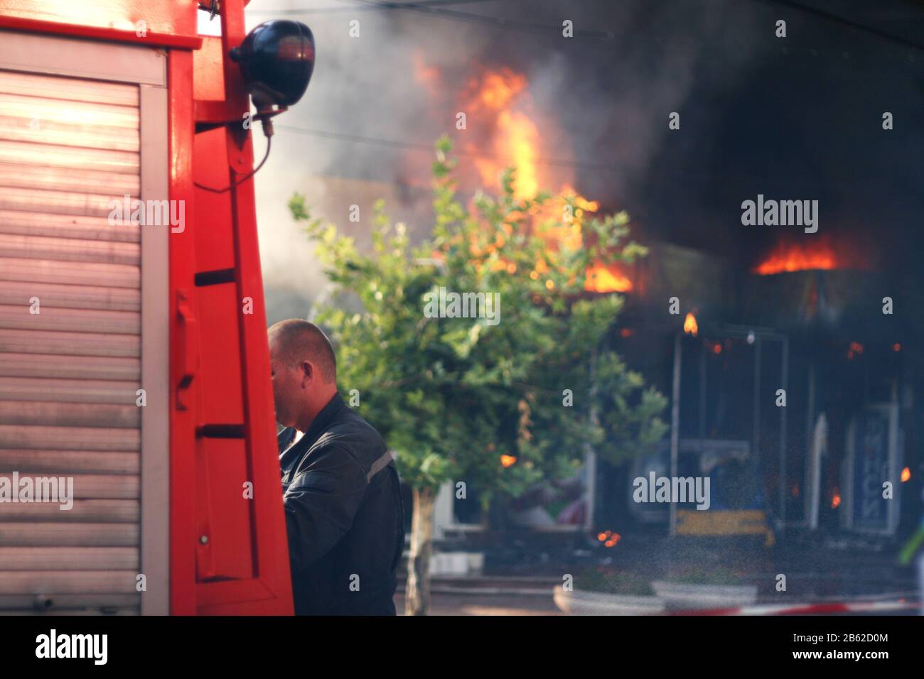 The fire brigade came to the fire call. Firefighters Work Concept Stock ...