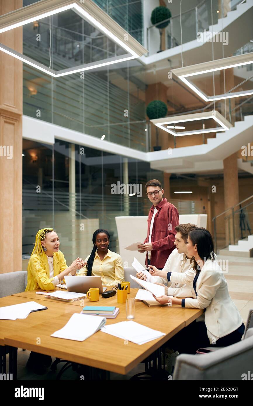Female advertising executive discussing hi-res stock photography and ...