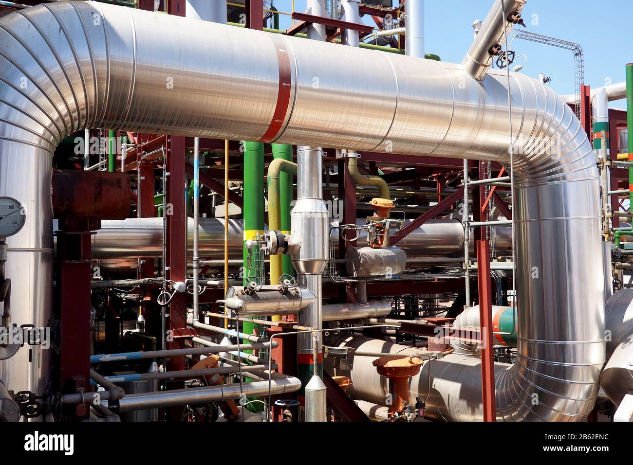Huge steel pipes in a factory Stock Photo - Alamy