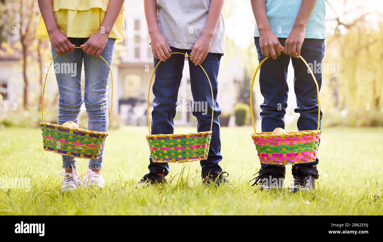 Children with baskets hi-res stock photography and images - Alamy