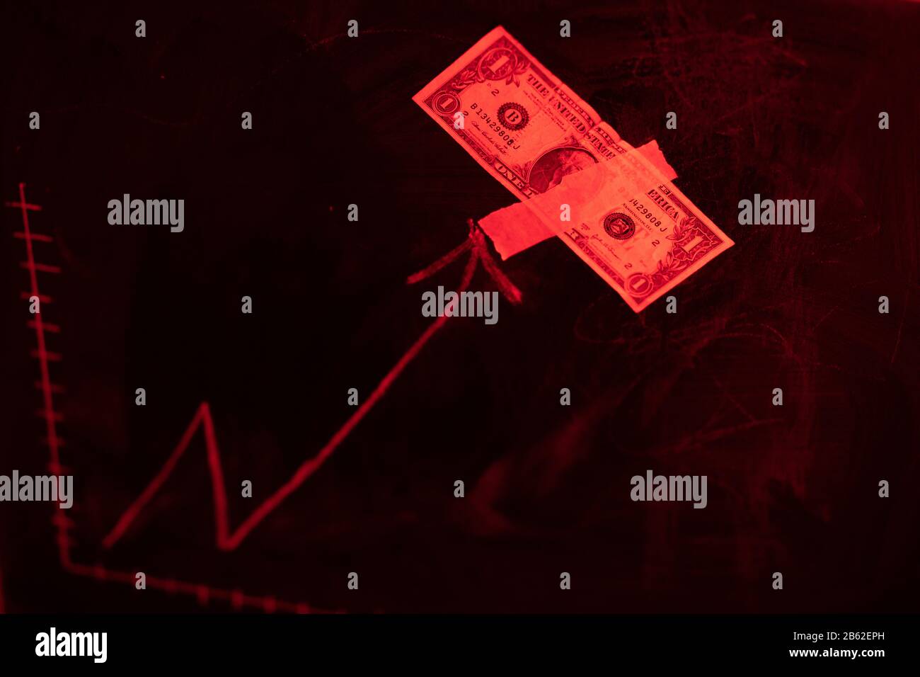 Dollar growth chart drawn on chalkboard. Investment concepts and ...