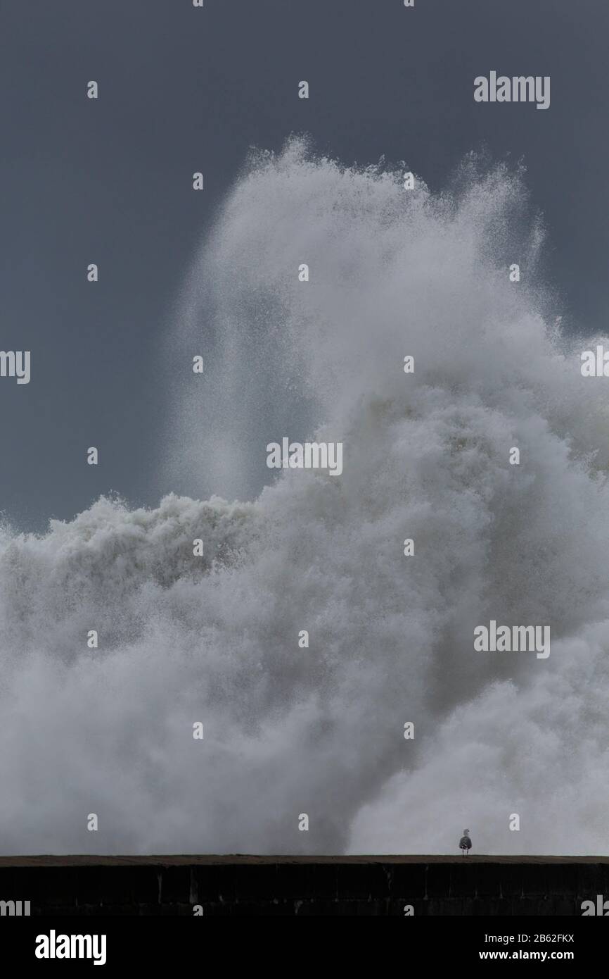 Huge wave splash over pier, Porto, Portugal Stock Photo - Alamy