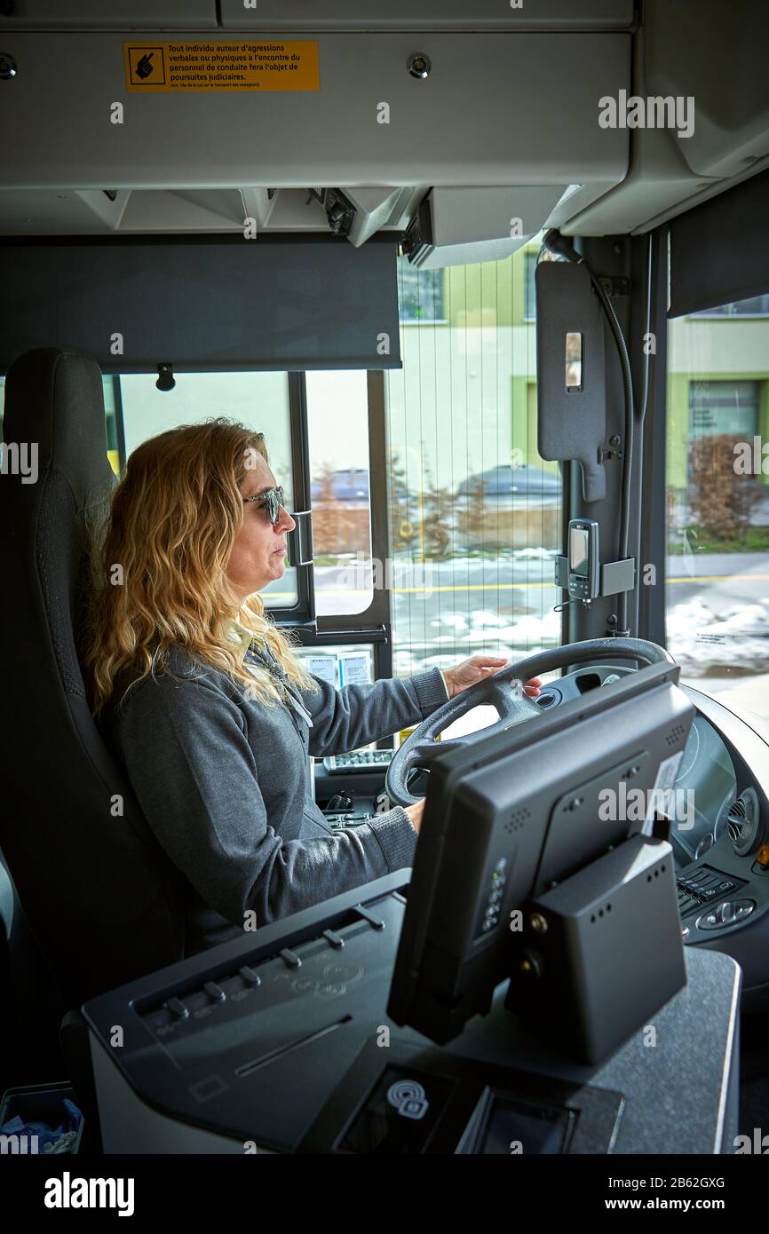 Woman driving bus hi-res stock photography and images - Alamy