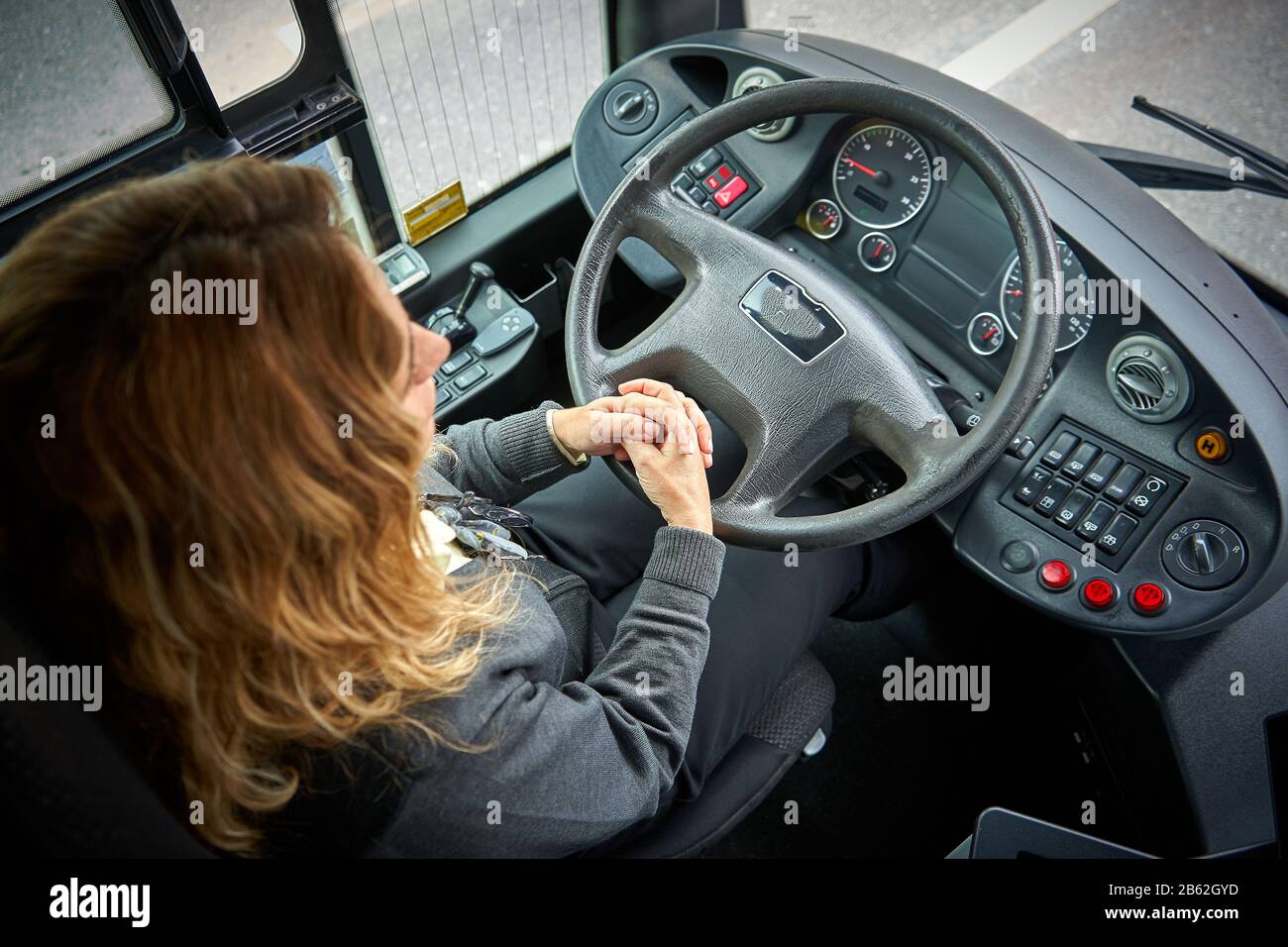 Woman driving bus hi-res stock photography and images - Alamy