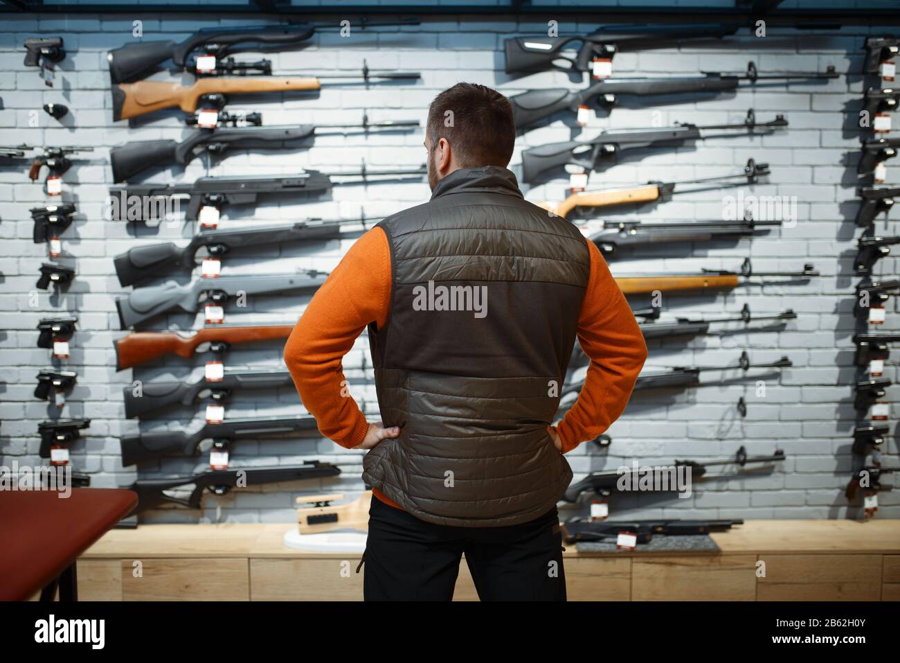 Back view man gun hi-res stock photography and images - Alamy